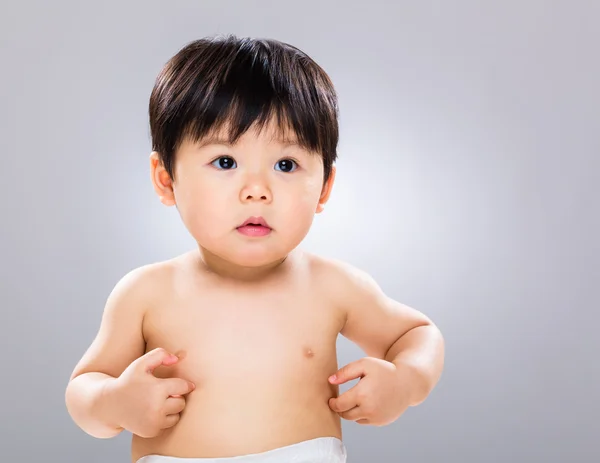 Little boy scratch his body Stock Photo by ©leungchopan 48868647
