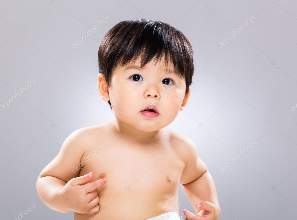 Little boy scratch his body Stock Photo by ©leungchopan 48868647