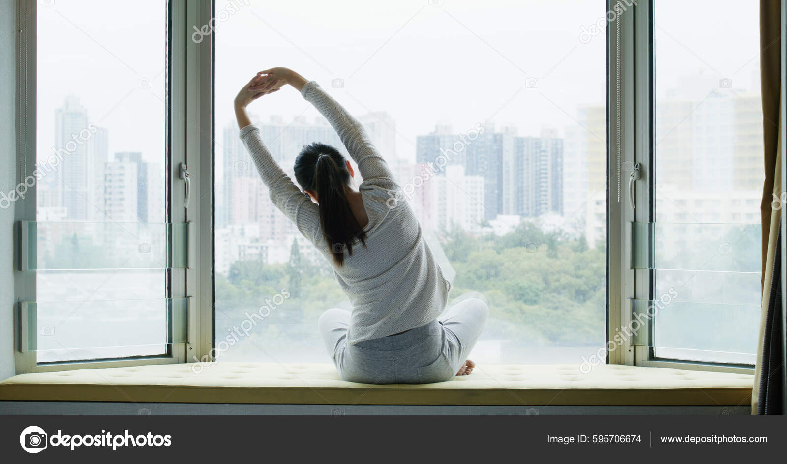 Woman Stretching Exercises Sit Front Window — Stock Photo © leungchopan ...
