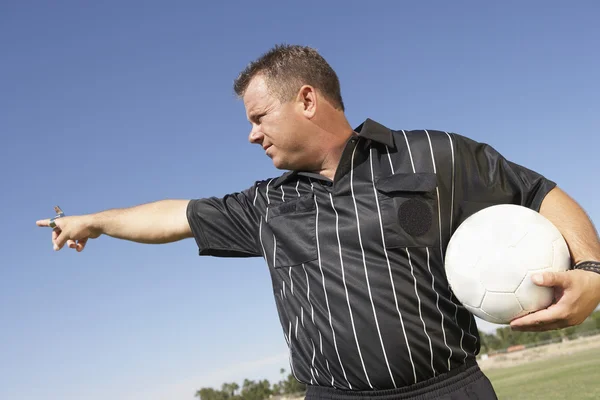 Referee With Soccer Ball Pointing Stock Photo by ©londondeposit 21939487