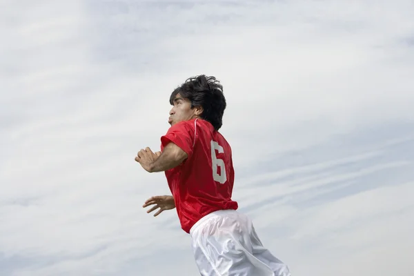 Player Jumping High To Hit Ball - Stock Image - Everypixel