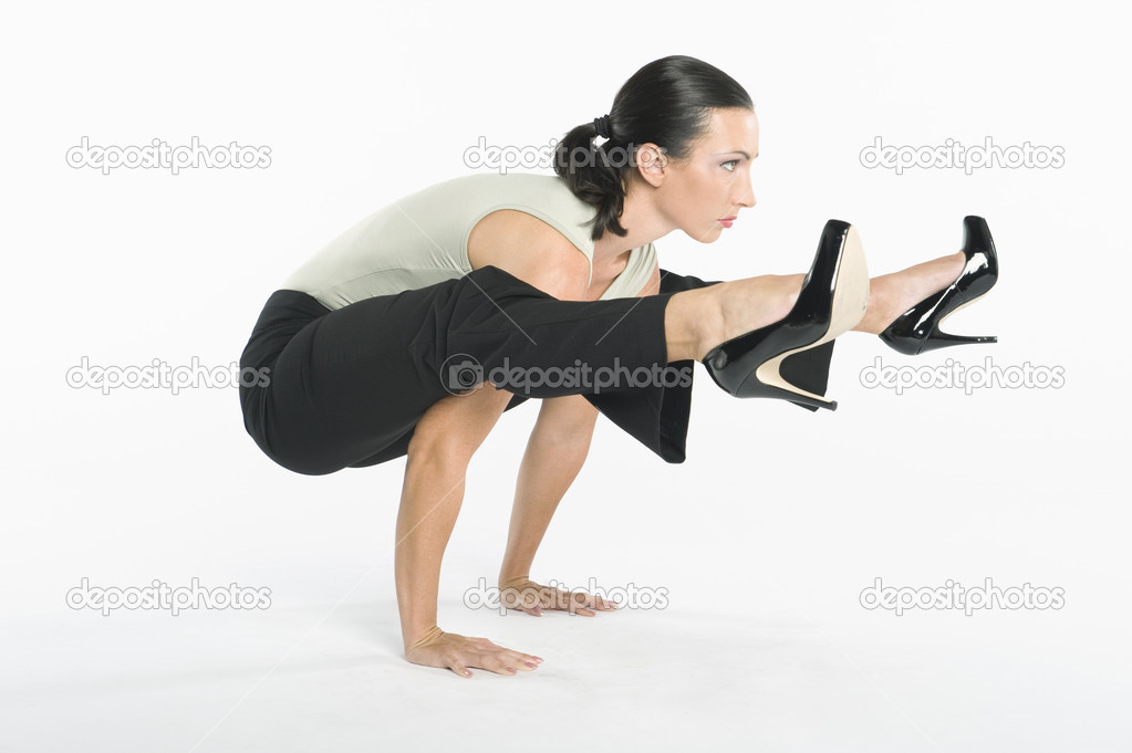 Woman with high heels exercising — Stock Photo © londondeposit #21784493