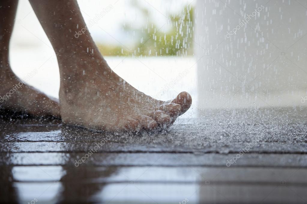 Woman's Feet Under Shower — Stock Photo © londondeposit #21787279 Woman's Feet Under Shower — Stock Photo © londondeposit #21787279