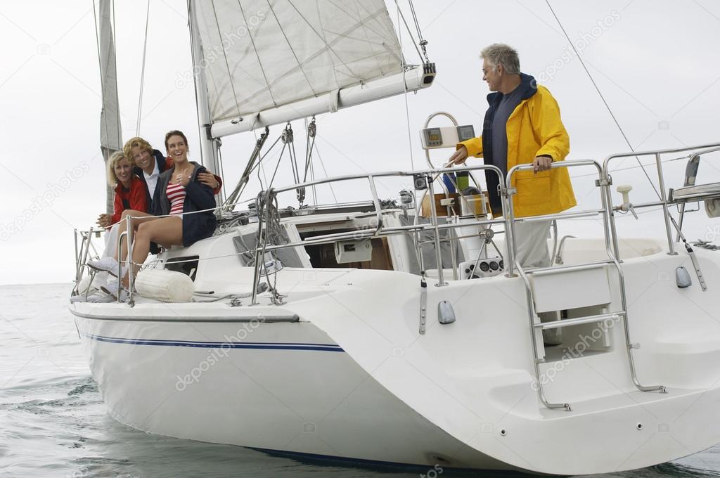 Family Sailing On Boat During Vacations — Stock Photo © londondeposit ...