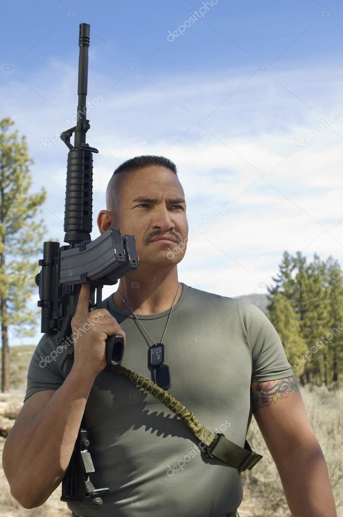 Soldier Standing With Gun