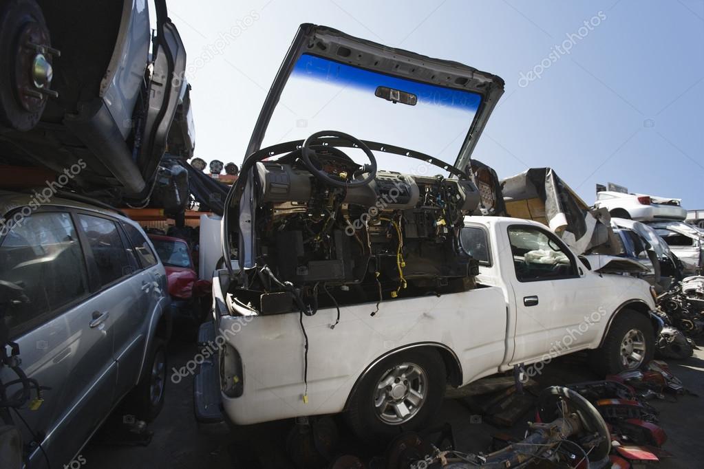 Vehicles And Parts In Scrap Yard Stock Photo by ©londondeposit 21802125