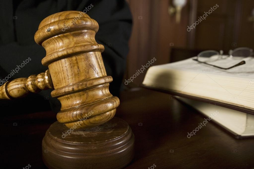 Judge Using Gavel — Stock Photo © londondeposit #21861853