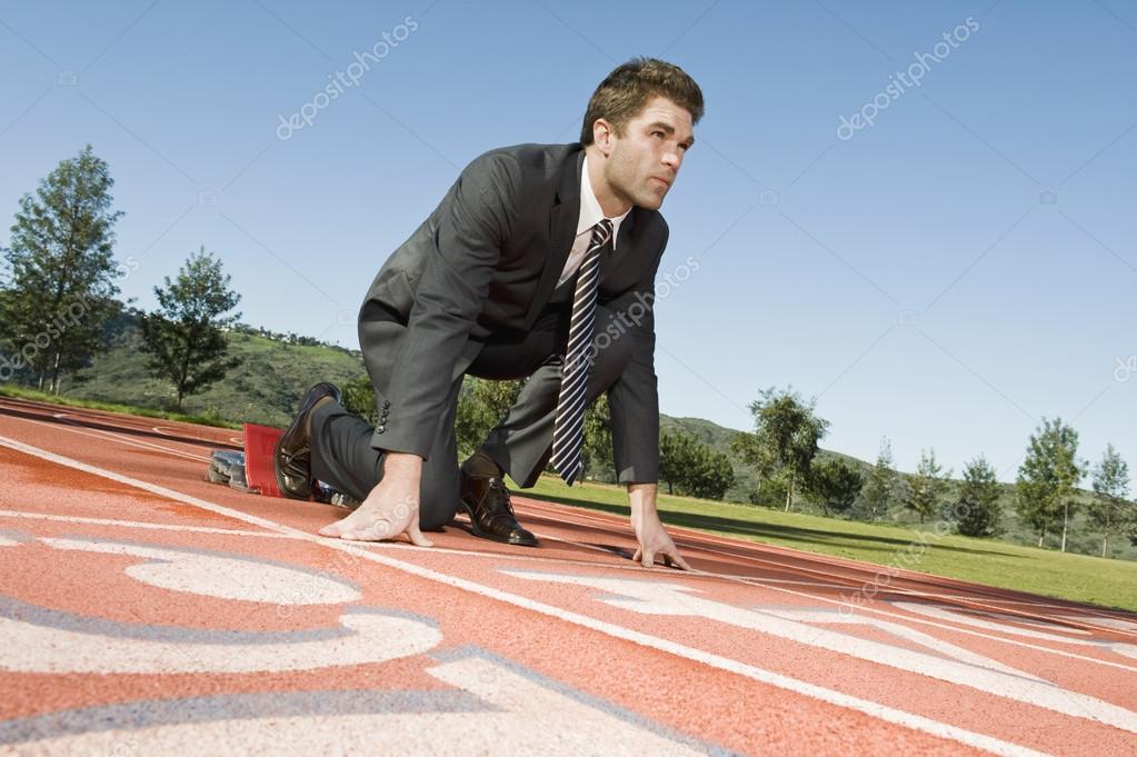 Businessman At The Starting Blocks — Stock Photo © londondeposit #21870031