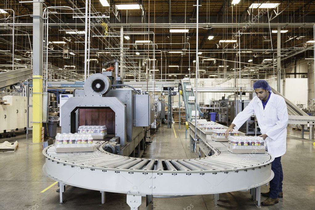 Man working in factory – Stock Editorial Photo © londondeposit #21874655