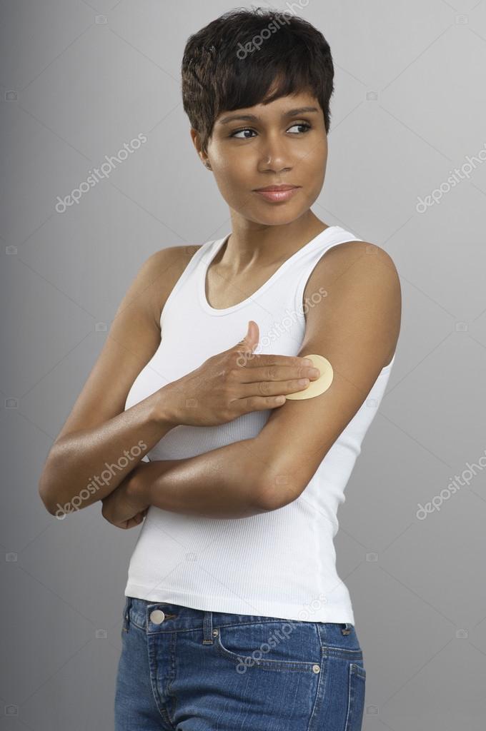 Young Woman With Nicotine Patch On Arm Stock Photo by ©londondeposit ...