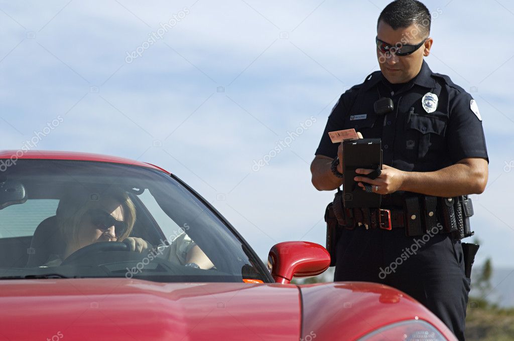 Traffic Cop By Sports Car — Stock Photo © londondeposit #21958671