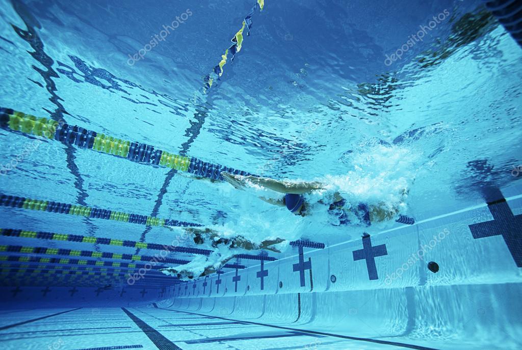 Swimmers Swimming In Pool — Stock Photo © londondeposit #21964431