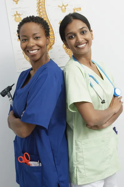 Medical Professionals Standing Back To Back Stock Photo by ...