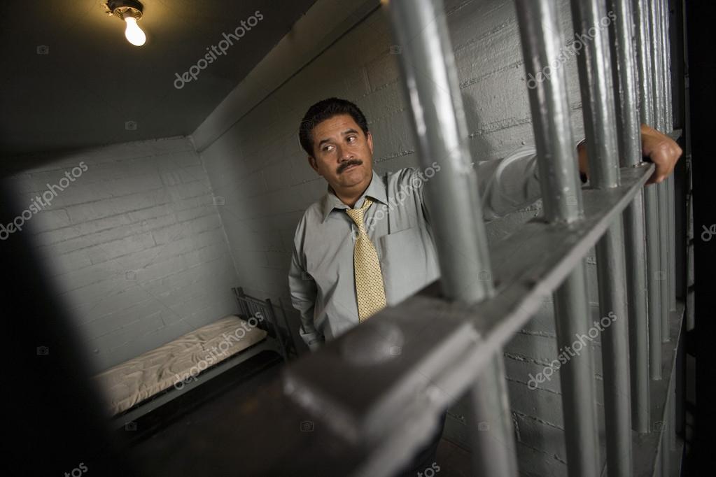 Criminal Behind Bars In Jail Stock Photo by ©londondeposit 21973007