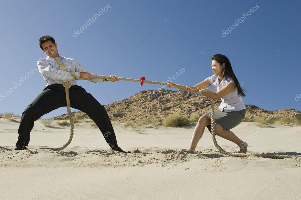 Two Business Playing Tug Of War In The Desert — Stock Photo ...
