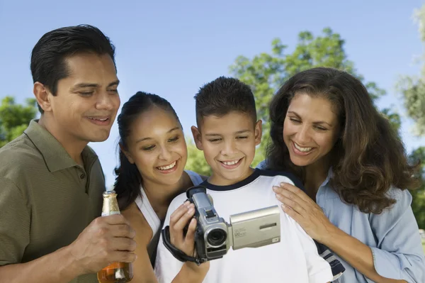 Family Watching Video Camera - Stock Image - Everypixel