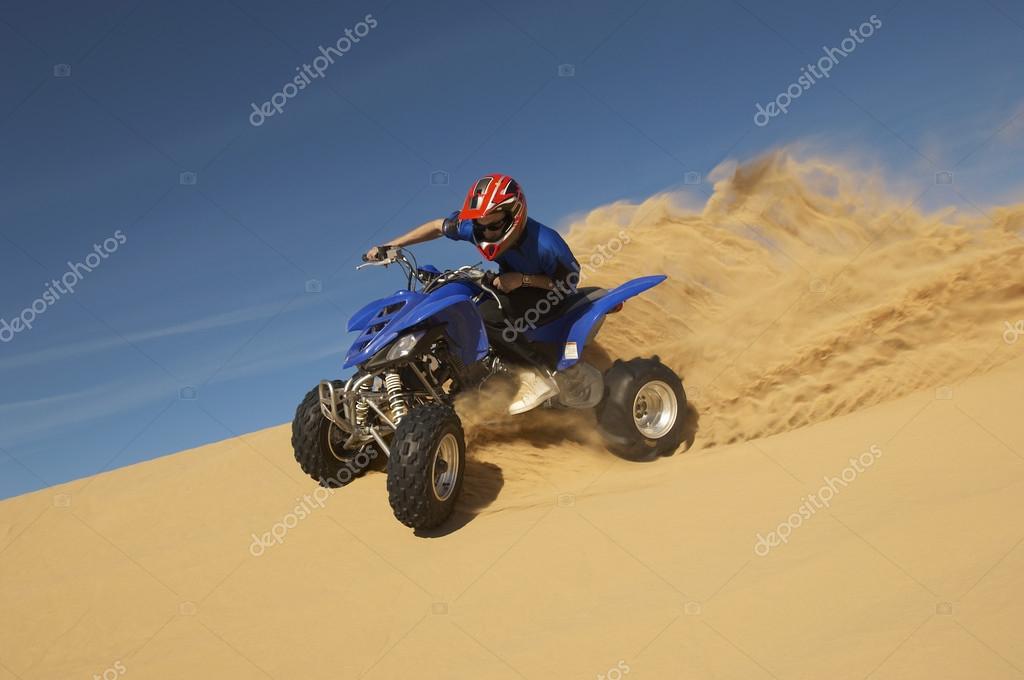 Man riding quad bike — Stock Photo © londondeposit #33798921