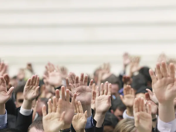 Crowd of people raising hands - Stock Image - Everypixel