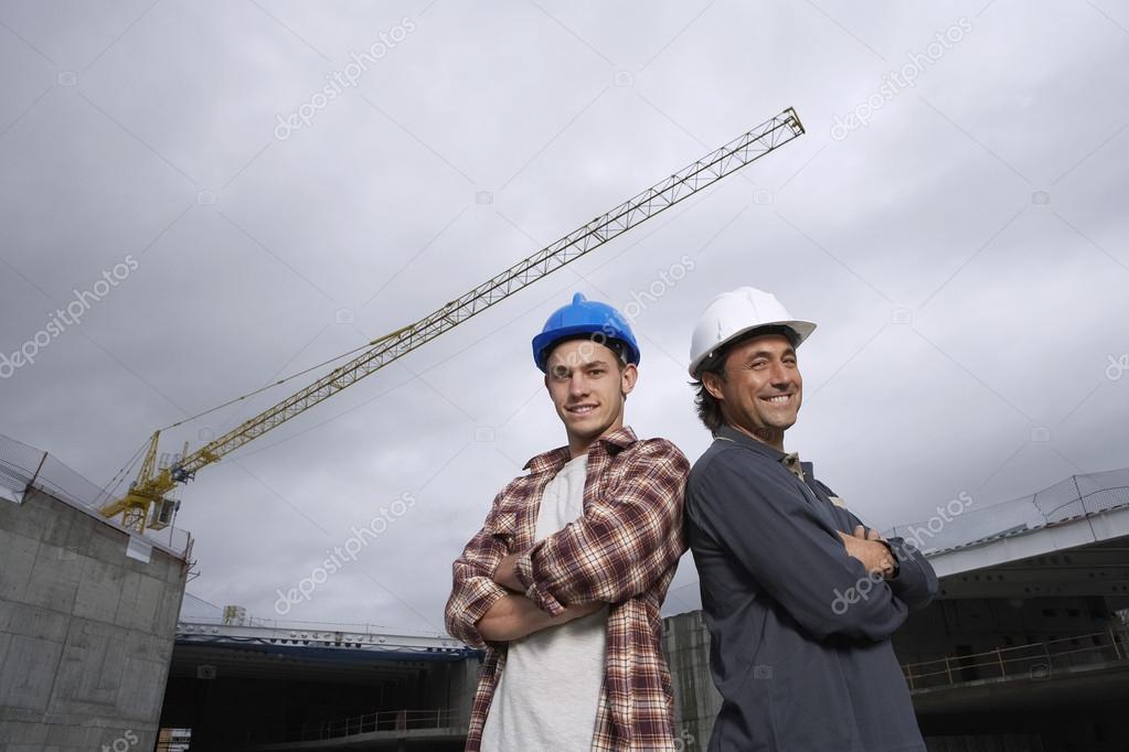 Construction workers on building site — Stock Photo © londondeposit ...