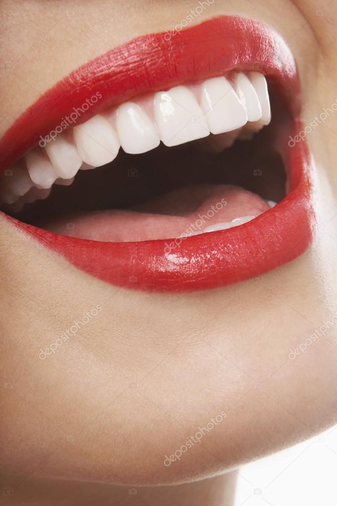 Mouth with red lipstick laughing Stock Photo by ©londondeposit 33824677