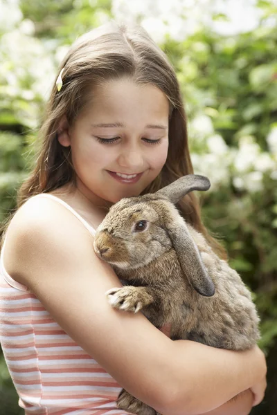 Girl hugging rabbit Stock Photos, Royalty Free Girl hugging rabbit ...