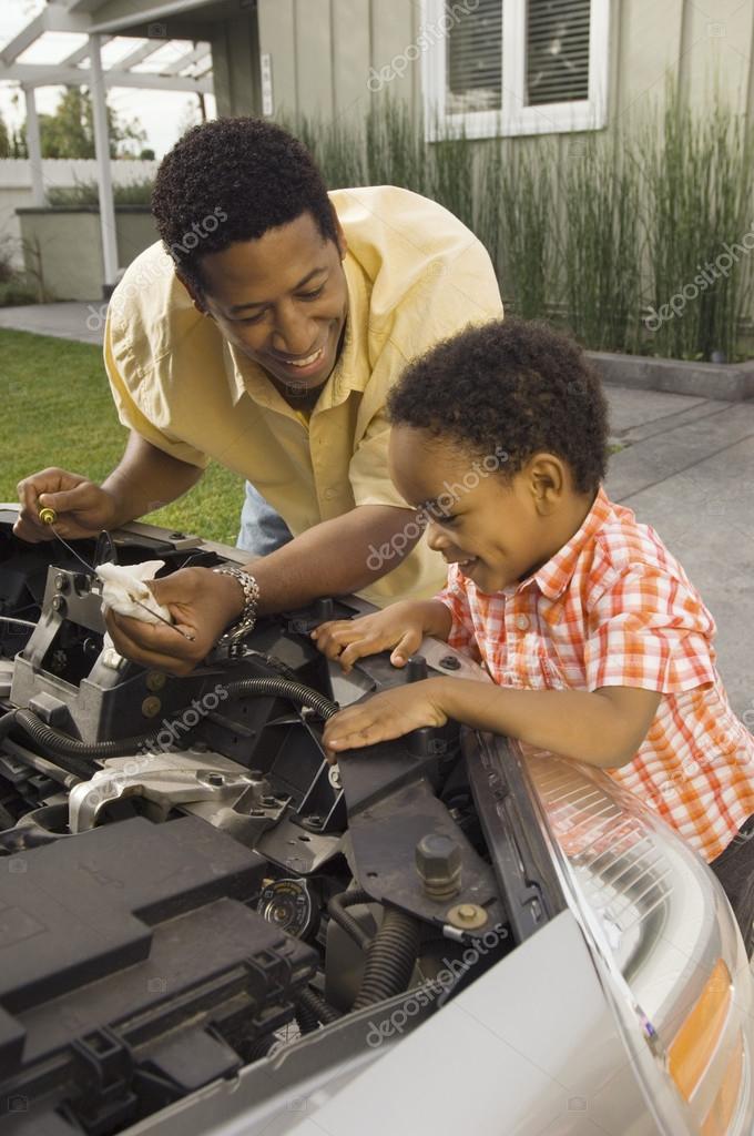 Son Helping Father Stock Photo by ©londondeposit 33832923