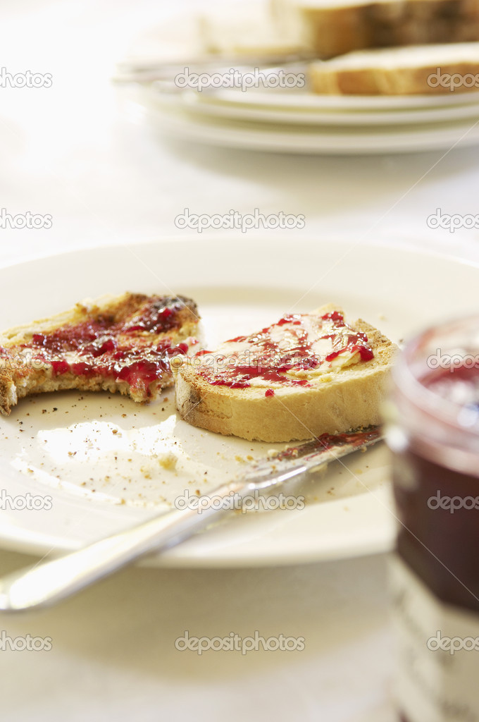 Toasts with jam on plate — Stock Photo © londondeposit #33838611