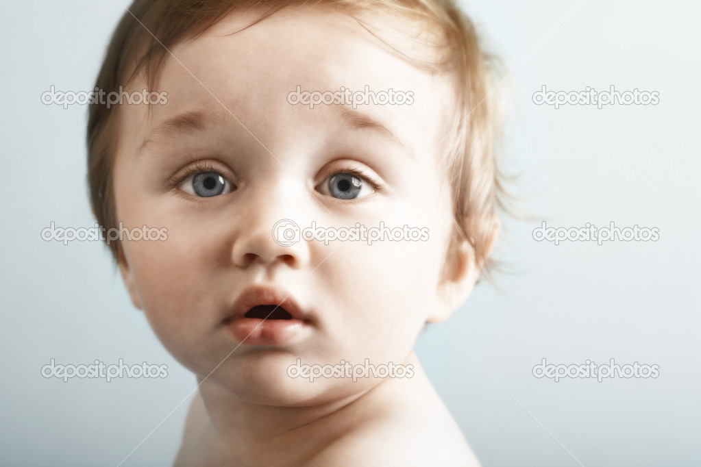 Toddler face looking at camera — Stock Photo © londondeposit #33839957