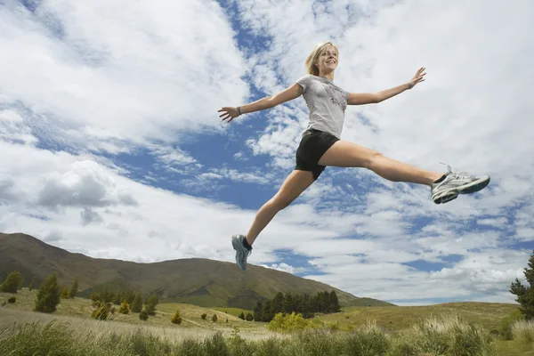 Woman leaping Stock Photos, Royalty Free Woman leaping Images ...
