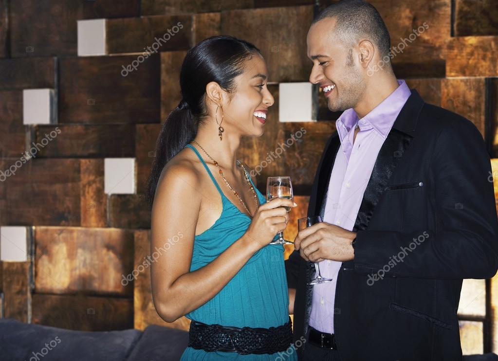 Couple flirting standing face to face — Stock Photo © londondeposit ...