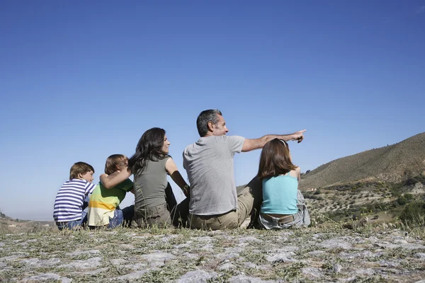 Family Resting in Mountain Range - Stock Image - Everypixel