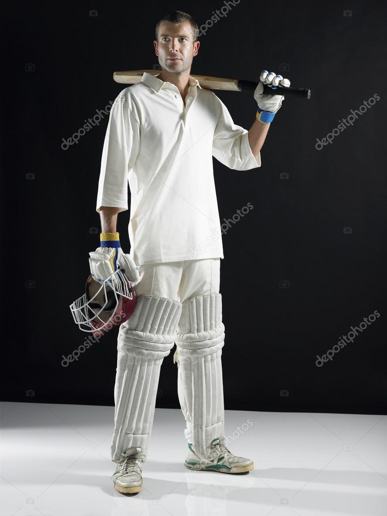 Cricket player holding bat — Stock Photo © londondeposit #33852275