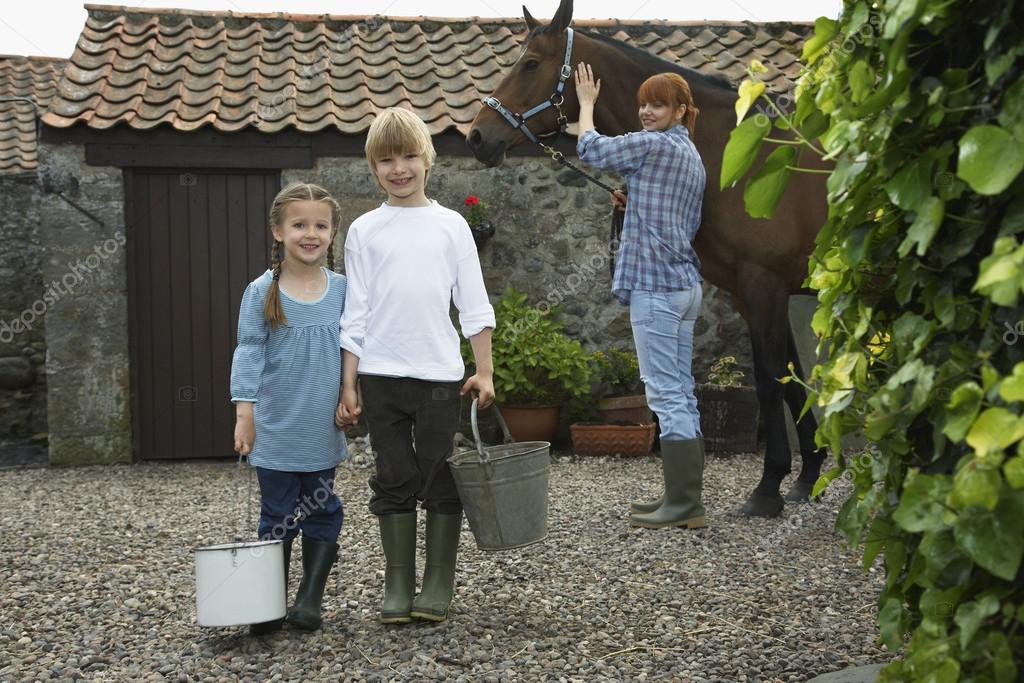 Children Holding Pails Stock Photo by ©londondeposit 33877501