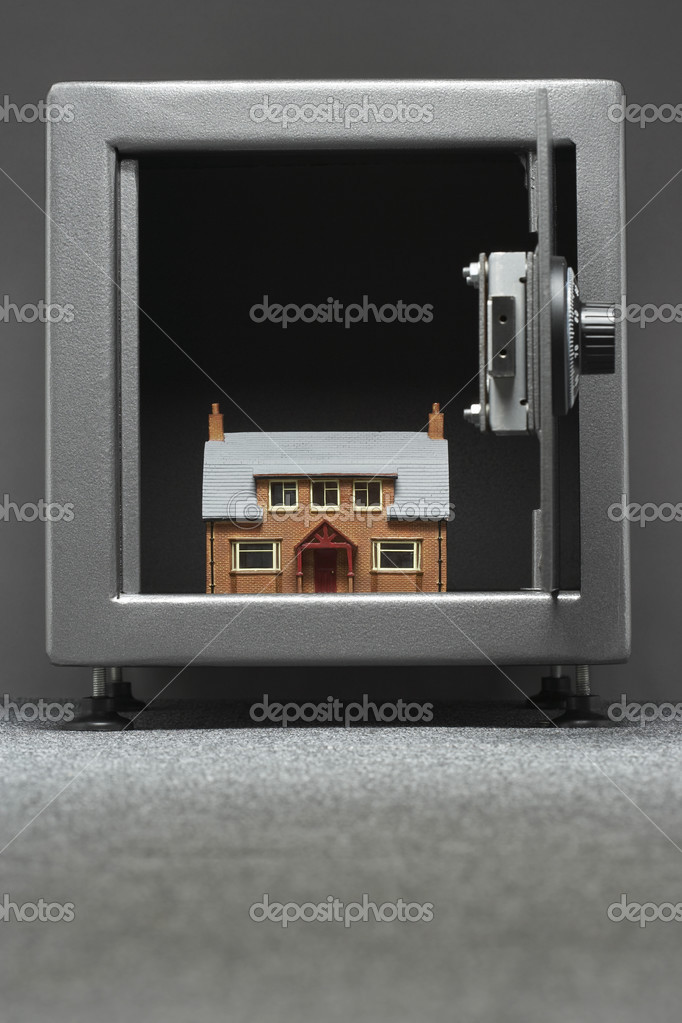 Model house in safe Stock Photo by ©londondeposit 33886825