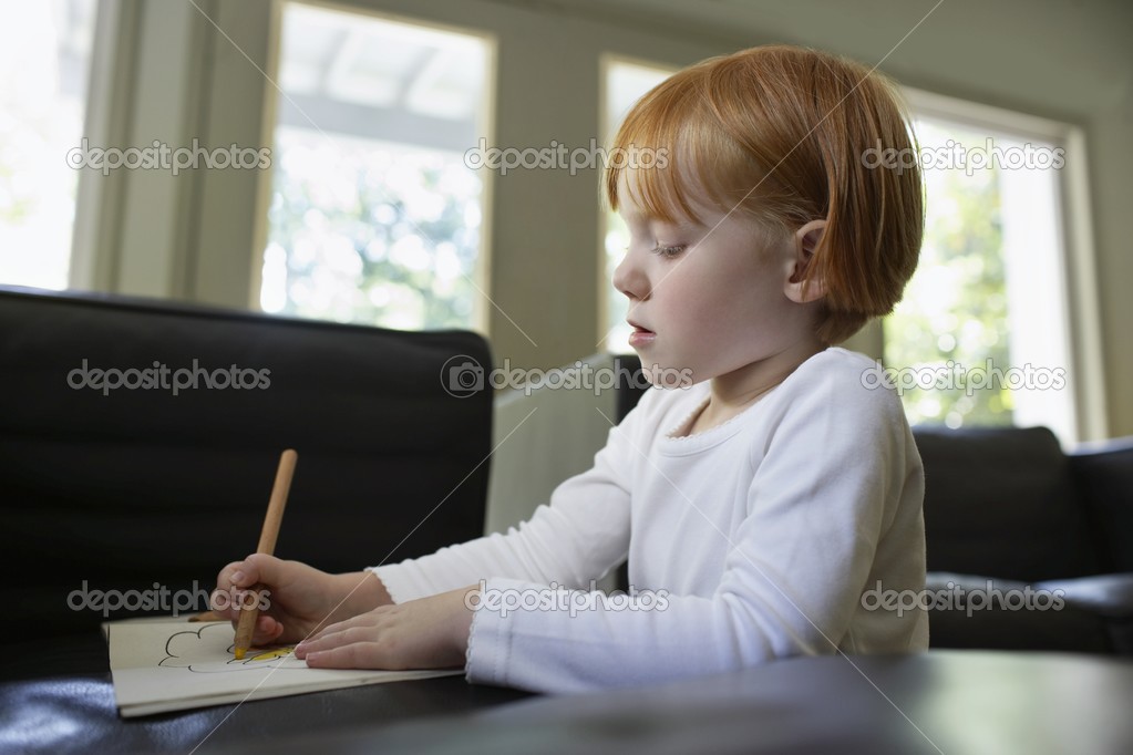 Girl drawing with crayon — Stock Photo © londondeposit #33887369
