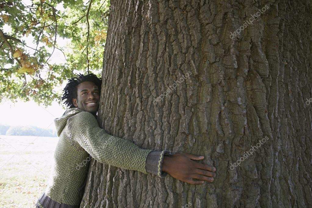 Man Hugging Tree