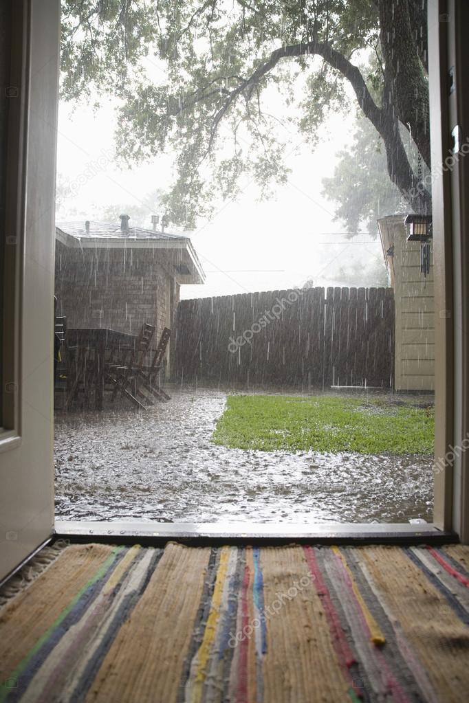 Heavy rain at backyard Stock Photo by ©londondeposit 33906371