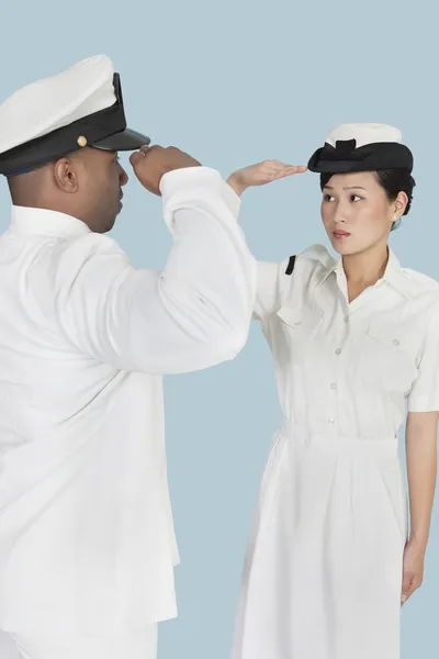 Navy officer saluting Stock Photo by ©londondeposit 34012911