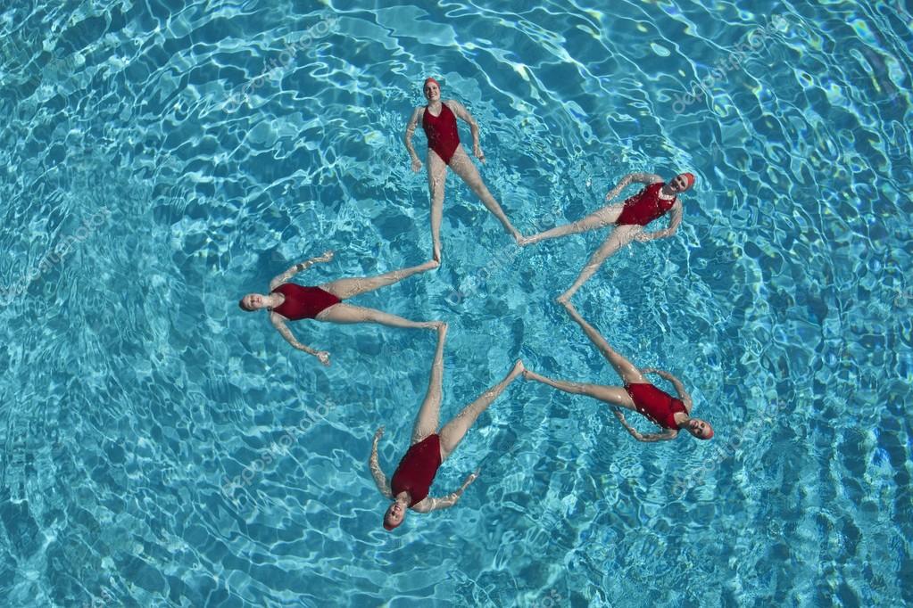 Group of synchronized swimmers — Stock Photo © londondeposit #34003169 Group of synchronized swimmers — Stock Photo © londondeposit #34003169