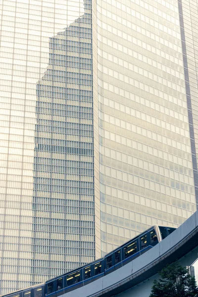 Train under skyscrapers - Stock Image - Everypixel