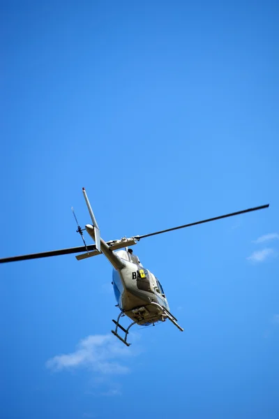 Front view of helicopter in flight. Fly over the snow mountain. — Stock ...