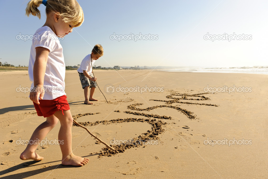 Kids writing in sand — Stock Photo © Daxiao_Productions #28404255