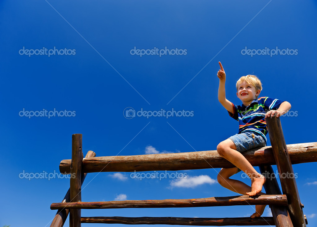 Boy in playground Stock Photo by ©Daxiao_Productions 28409781