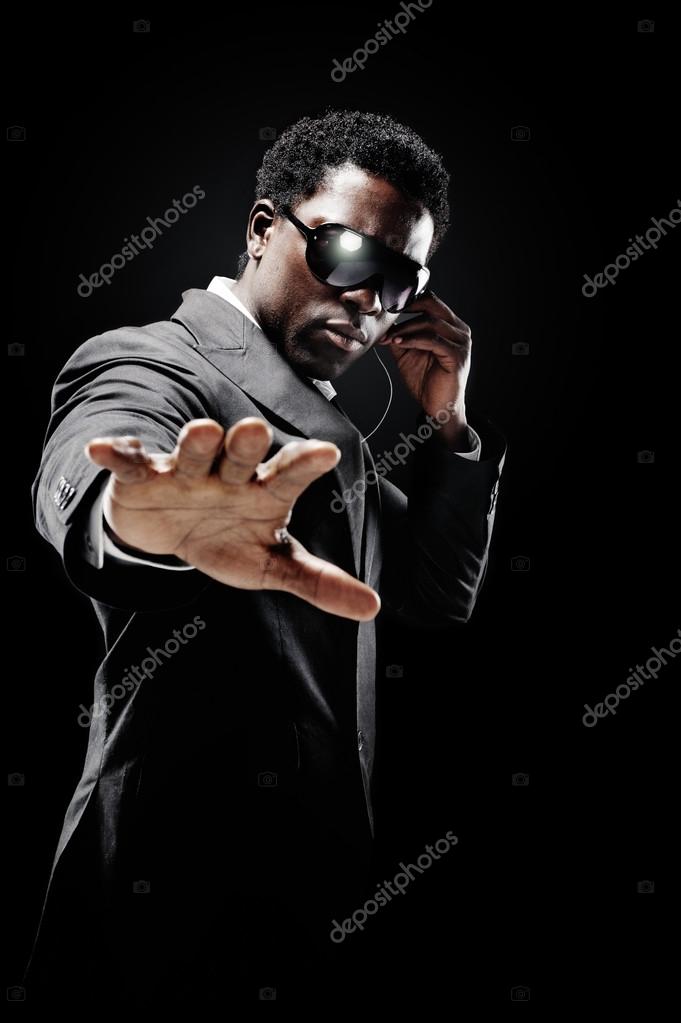 Bodyguard black man Stock Photo by ©Daxiao_Productions 28417051