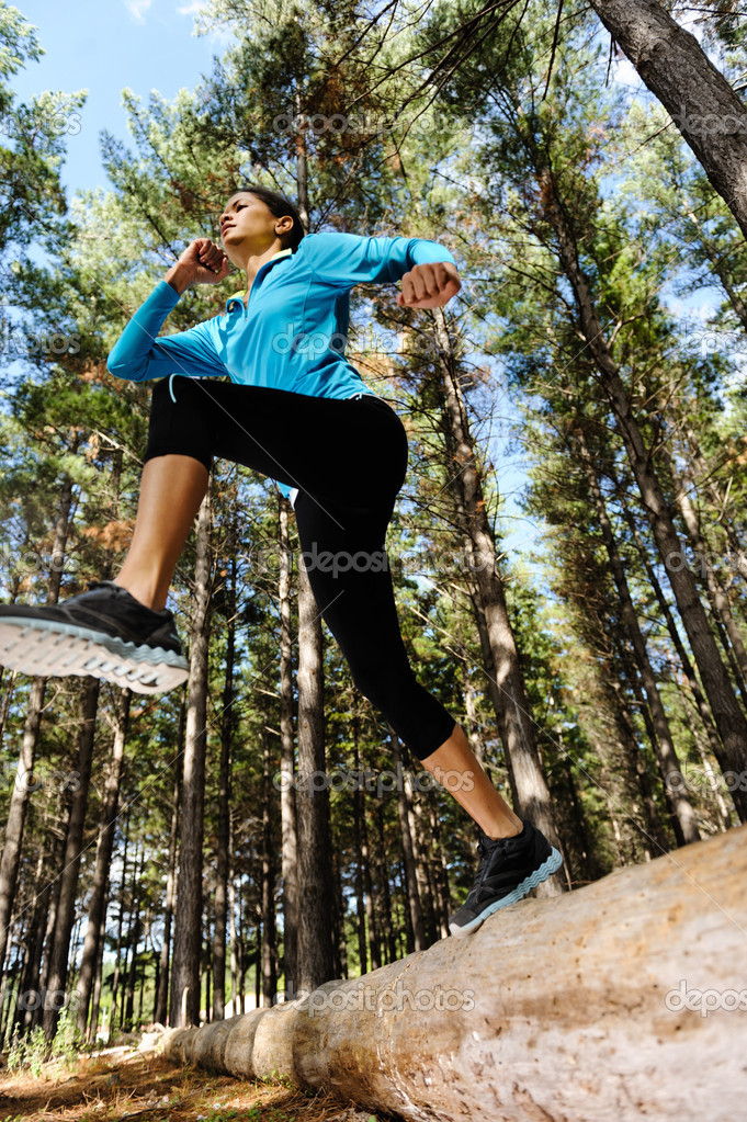 Forest running woman Stock Photo by ©Daxiao_Productions 28423739