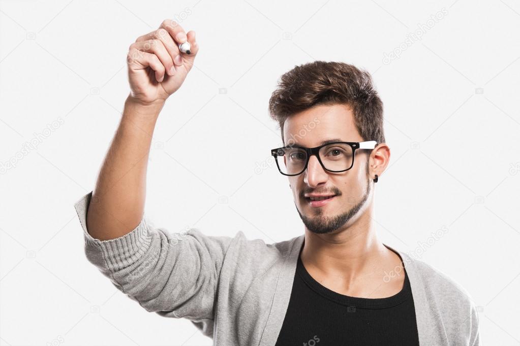 Young man writing on a glass — Stock Photo © ikostudio #41311633