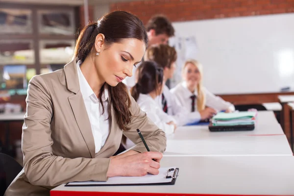 Beautiful young teacher preparing Stock Photos, Royalty Free Beautiful ...