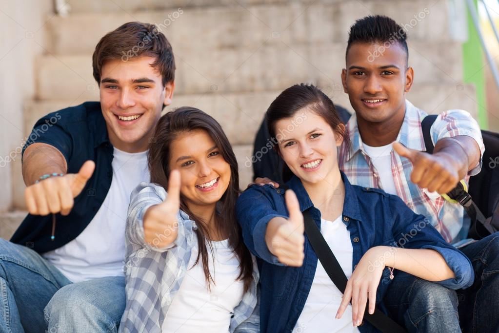 High school students giving thumbs up Stock Photo by ©michaeljung 26746839