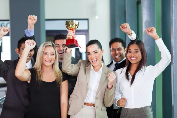Cheerful business team winning an award - Stock Image - Everypixel