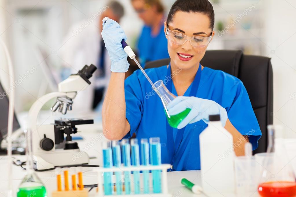Lab technician handling liquid in lab — Stock Photo © michaeljung #28706693
